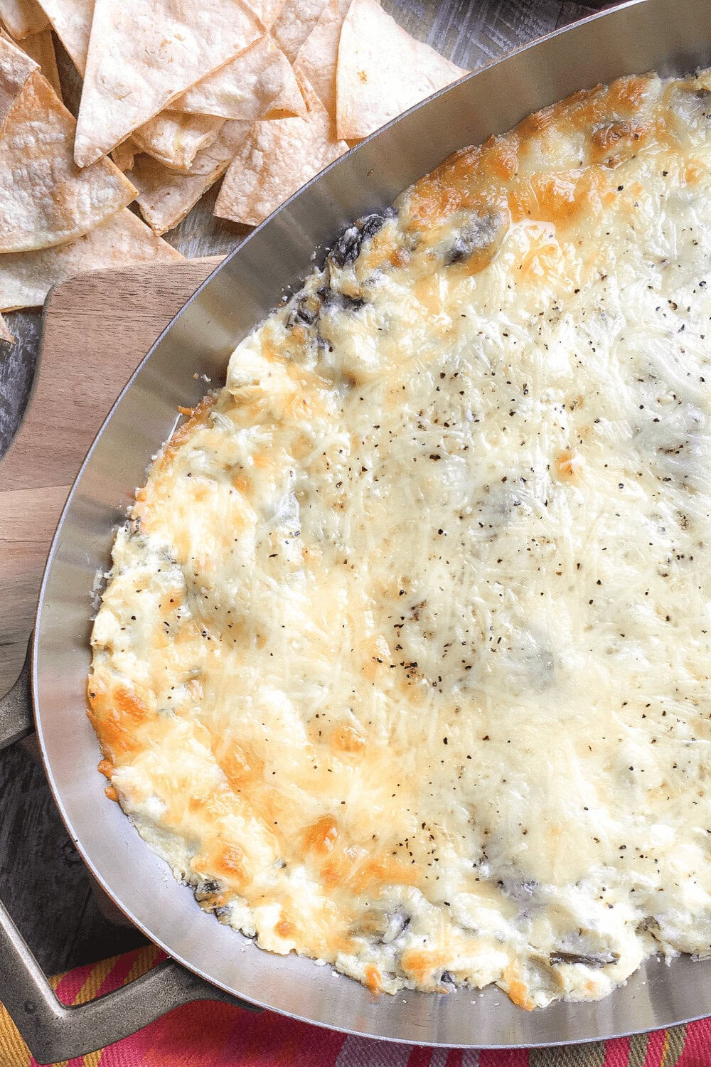 Cheesy Spinach Artichoke Dip with Toasted Tortilla Chips